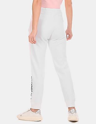 Buy Calvin Klein Women White Slim Fit Stripe Side Logo Knit Joggers NNNOW